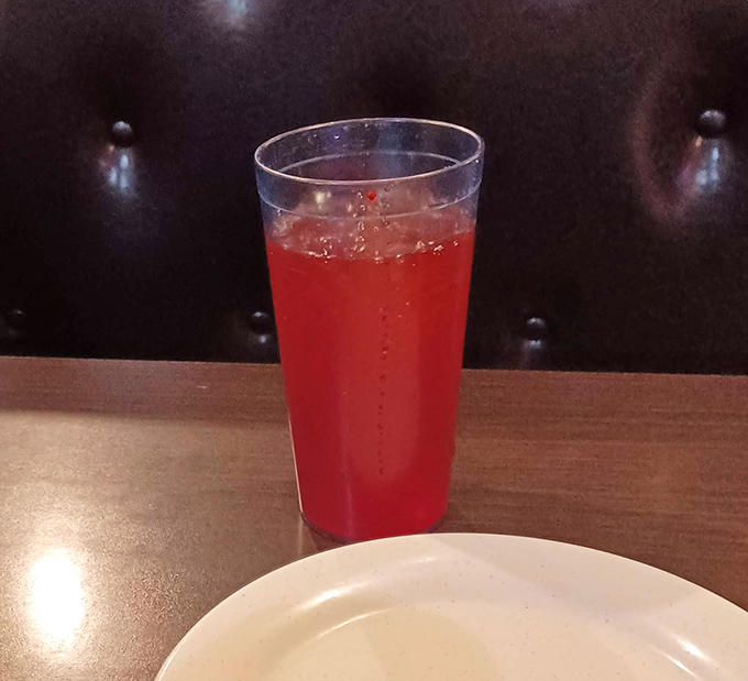 The mysterious red beverage&mdash;possibly fruit punch, possibly liquid happiness&mdash;standing by to wash down your fifth trip to the buffet.