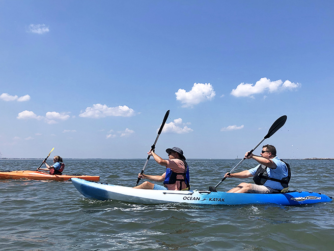 Kayaking toward the lighthouse&mdash;where upper body workouts come with views that make you forget you're exercising.