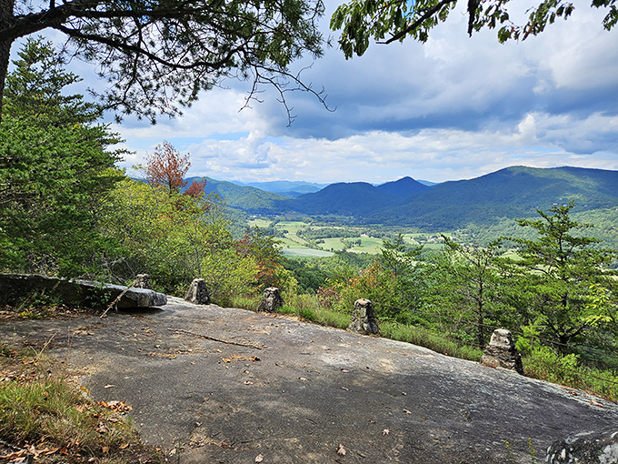 Ancient rock outcroppings offer front-row seats to valley views that change with every passing cloud. No ticket required, just comfortable shoes.