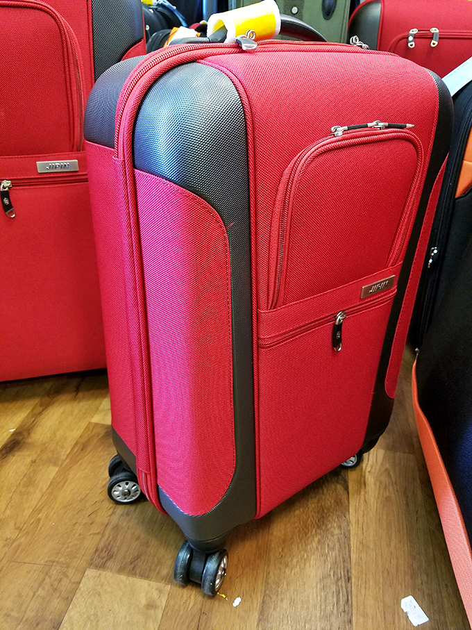That red suitcase isn't just luggage&mdash;it's adventures waiting to happen, ready to roll toward your next budget-friendly getaway.