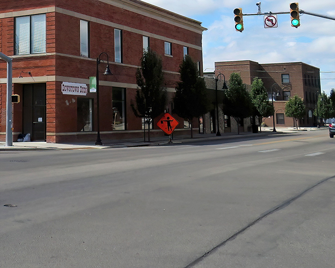 Brick storefronts along the main drag stand solid and unpretentious, exactly like the people who've kept them running.