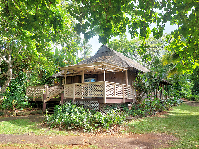 This traditional structure welcomes visitors into a space where cultural learning meets breathtaking natural beauty effortlessly.