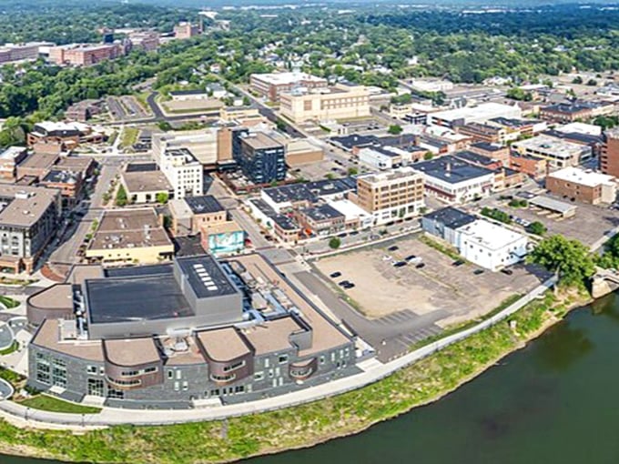 Eau Claire's aerial view reveals a city embraced by green spaces and waterways&mdash;nature's version of a warm hug around urban convenience.