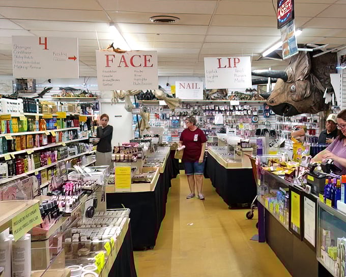 A beauty supply booth where the giant horse head watching over shoppers suggests this isn't your typical department store makeup counter.