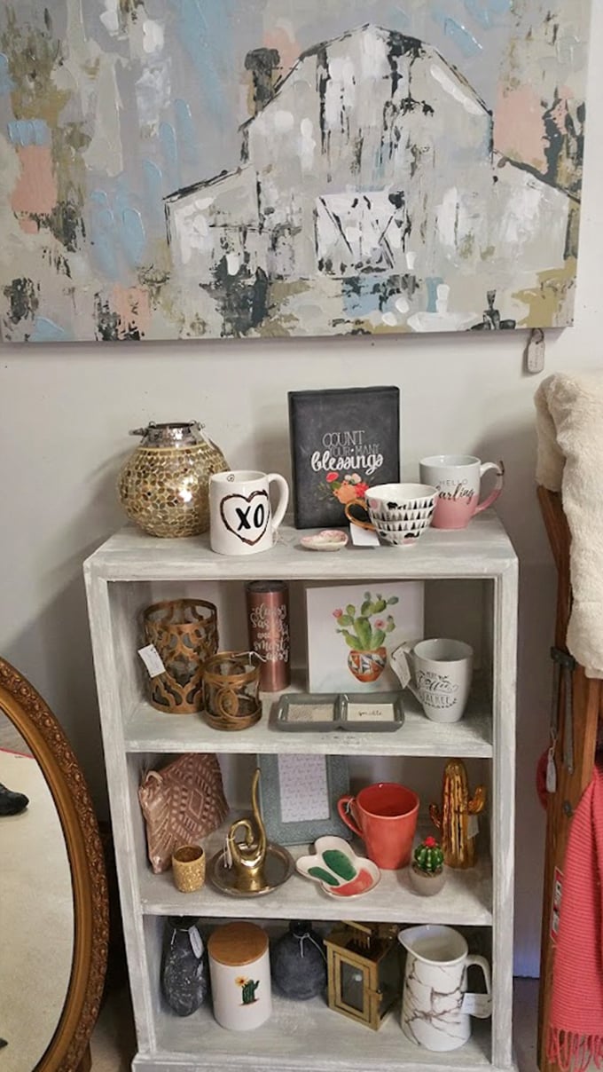 Modern meets vintage in this charming display where contemporary farmhouse aesthetics blend with genuine antique elements&mdash;proving good style never truly goes out of fashion.