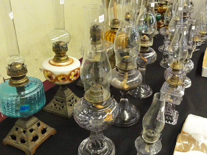 Oil lamps gleam with the promise of ambiance, ready to transform power outages from inconveniences into romantic adventures by flickering light.