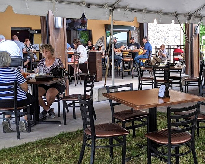 The outdoor seating area: where fresh air meets fresh food, and Pennsylvania summer evenings stretch deliciously into night.