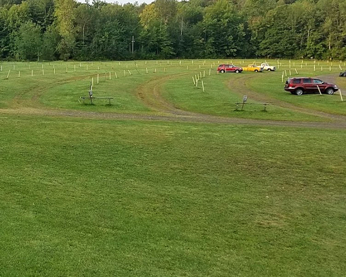 Cars find their places like puzzle pieces fitting together, each creating its own private screening room under the vast upstate New York sky.