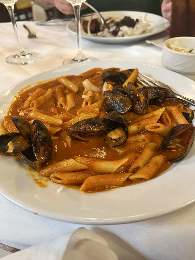 Pasta with mussels in a sauce so good you'll want to write poetry about it. The sea meets Italy meets Cuba in one glorious dish.