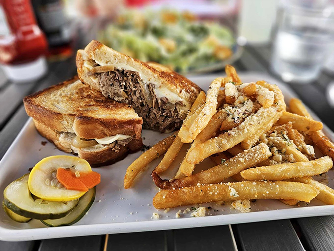 This sandwich has layers of flavor that would make a geology professor weep with joy. Those fries look hand-cut and perfectly golden.