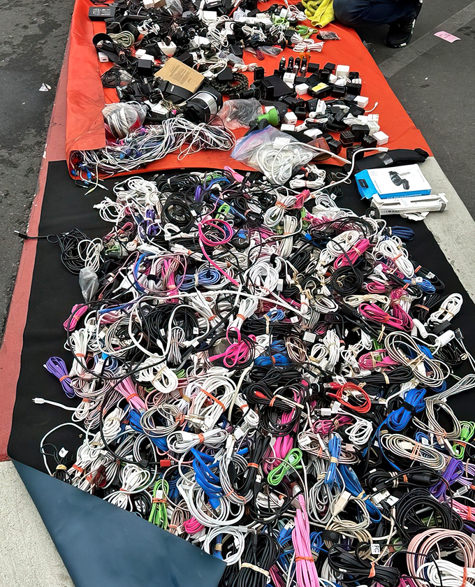 Cable chaos that would make Marie Kondo weep &ndash; yet somewhere in this tangle lies the exact charger you've been searching for.