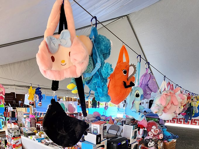 Stuffed characters hang like festive pi&ntilde;atas above tables crowded with treasures&mdash;childhood nostalgia available for the price of pocket change.