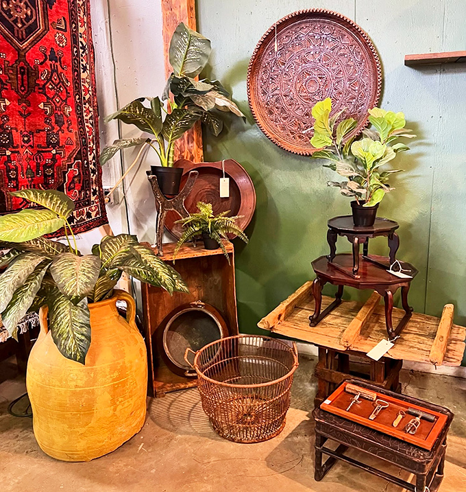 Nature meets nostalgia in this corner where copper vessels, woven baskets, and lush plants create an earthy vintage vignette.