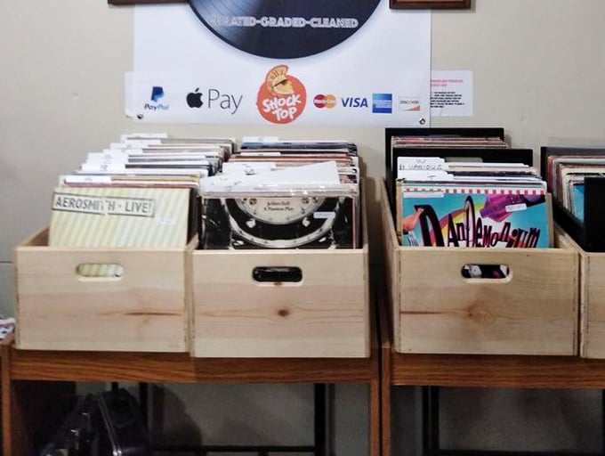Wooden crates filled with vinyl treasures&mdash;where Aerosmith meets obscure bands in a musical time capsule waiting to be explored.