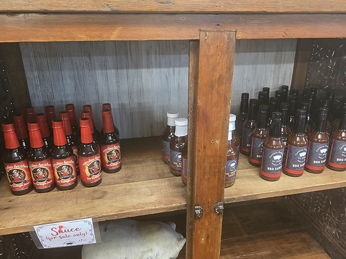 The sauce arsenal&mdash;where vinegar meets tomato meets spice meets sweet. Choose your weapon wisely; barbecue allegiances run deep here.