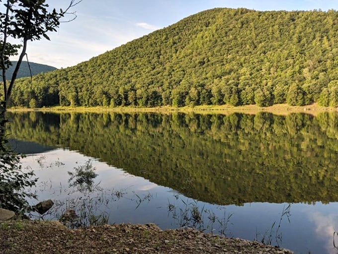 When the mountains dip their toes into the reservoir, creating reflections so perfect you'd swear the world turned upside down.