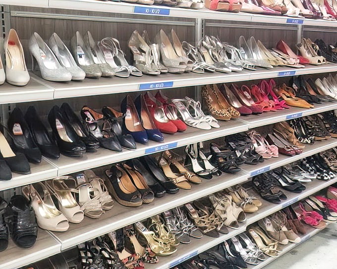 Heels, flats, and everything between arranged by size, because even Cinderella would struggle without proper organization at this scale.