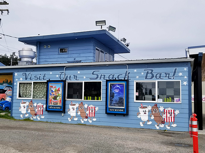 Dancing popcorn and hot dogs painted on blue walls&mdash;this snack bar exterior promises delicious things await inside.