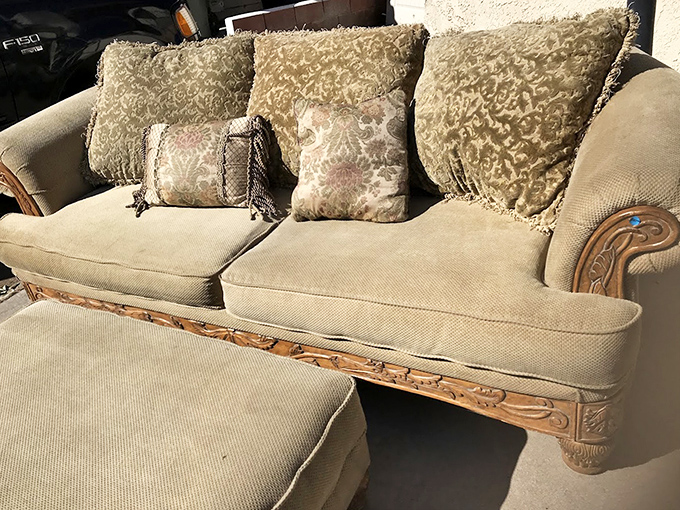 A sofa with character that's seen some living but has plenty more to give. Those cushions have stories to tell, but they're ready to be part of your next chapter.