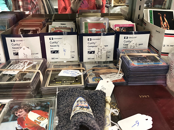 Sports cards and memories, carefully preserved in plastic. Childhood obsessions transformed into "investment portfolios" for grown-ups. 