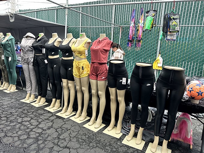 The mannequin army stands at attention, modeling athleisure that costs less than your post-workout smoothie.