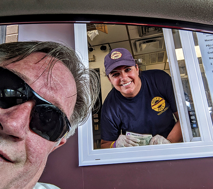 The drive-thru window &ndash; where hot dog dreams come true with a smile. Service with genuine Iowa warmth.