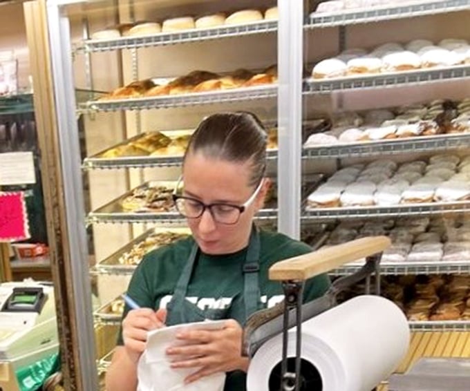The concentration on this baker's face says everything: at Stock's, pastry isn't just business &ndash; it's serious, delicious art.