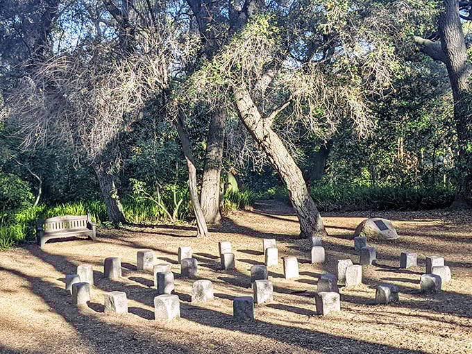 This stone labyrinth invites contemplation under ancient oaks. Walking its path feels like a meditation in motion.