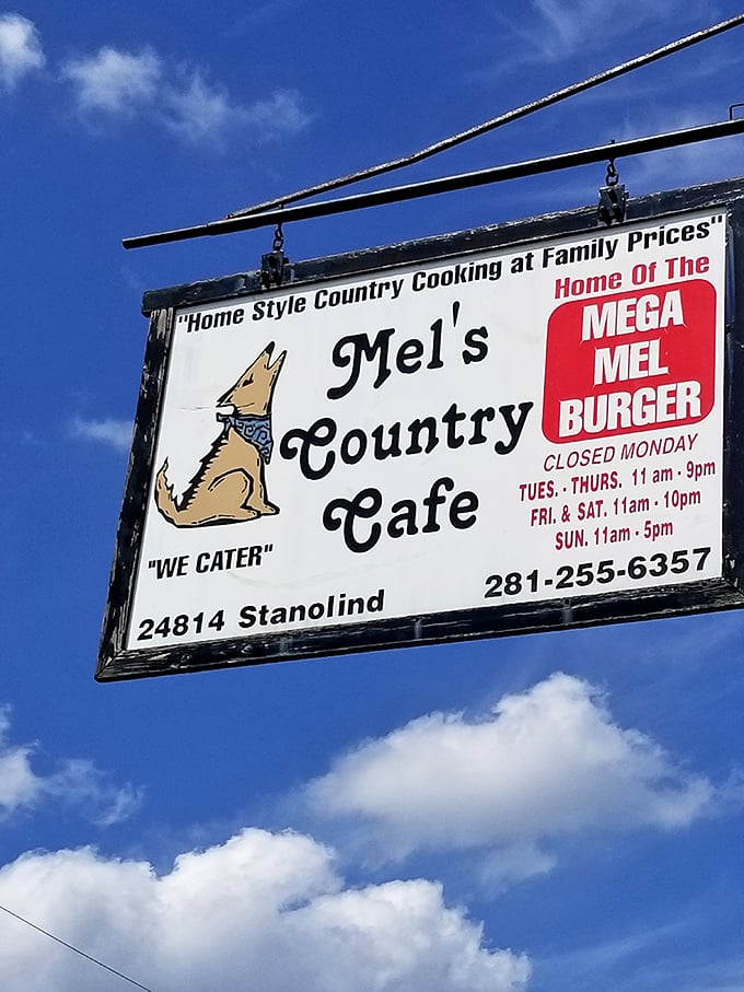 The sign that's guided hungry travelers for years, featuring Mel's mascot and the legendary Mega Mel Burger. Closed Mondays&mdash;they need recovery time.