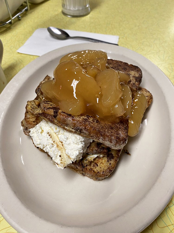 French toast transformed into dessert for breakfast. The apple topping makes it practically a fruit salad, or so you'll tell yourself.