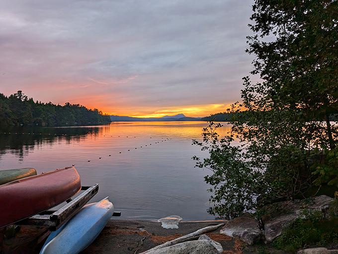 Nature's own light show as sunset paints Sebec Lake in impossible colors. No filter needed&mdash;though you'll be tempted to use one anyway.