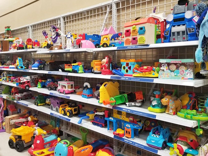 Toy paradise! Three tiers of plastic joy where today's bargain might become tomorrow's favorite plaything or a collector's prized possession.