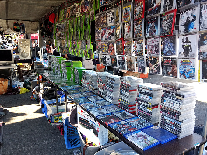 Gaming nostalgia by the pound. This vendor's carefully organized collection spans generations of consoles, from pixelated classics to modern masterpieces.