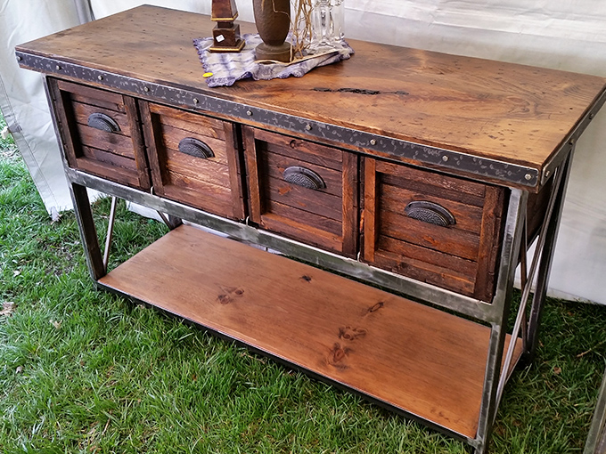 This handcrafted console table with industrial elements proves that "farmhouse chic" isn't just a Pinterest fantasy&mdash;it's alive and well in Nebraska.