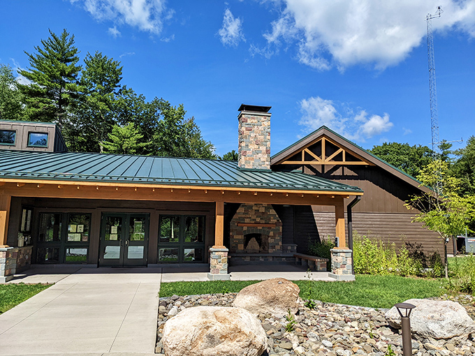 The visitor center blends rustic charm with modern amenities. That stone fireplace has probably heard thousands of "you should have seen the one that got away" stories.
