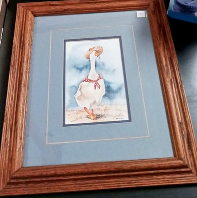 A whimsical duck in a bonnet? Someone's grandmother is smiling from heaven right now.