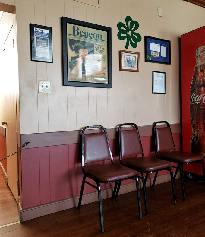 The wall d&eacute;cor tells stories of community pride and history. No interior designer needed when you've got decades of local love.