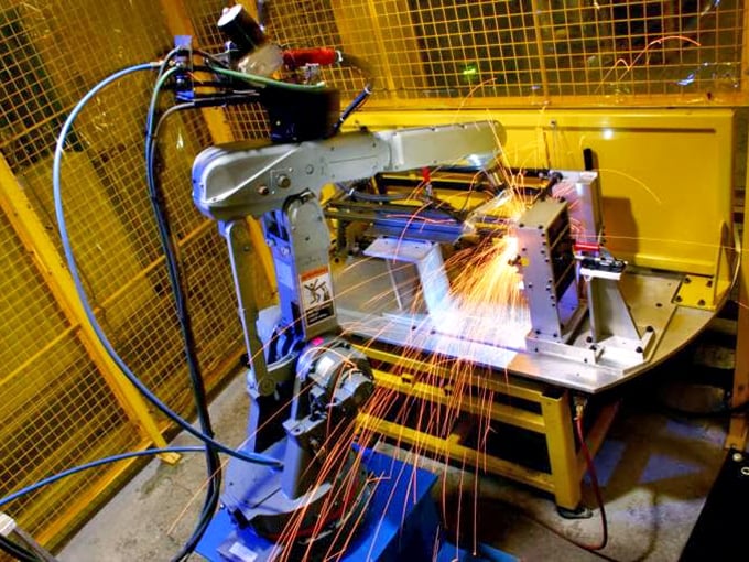 Industrial ballet in motion &ndash; this welding robot creates more sparks than a first date, crafting precision parts for someone's next big project.