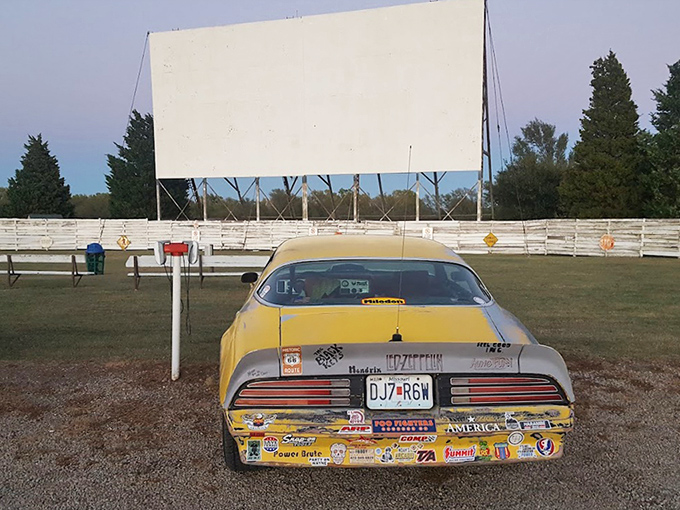 This sunshine-yellow classic, decorated with a lifetime of stickers, isn't just transportation&mdash;it's a time machine parked perfectly for cinematic memories.
