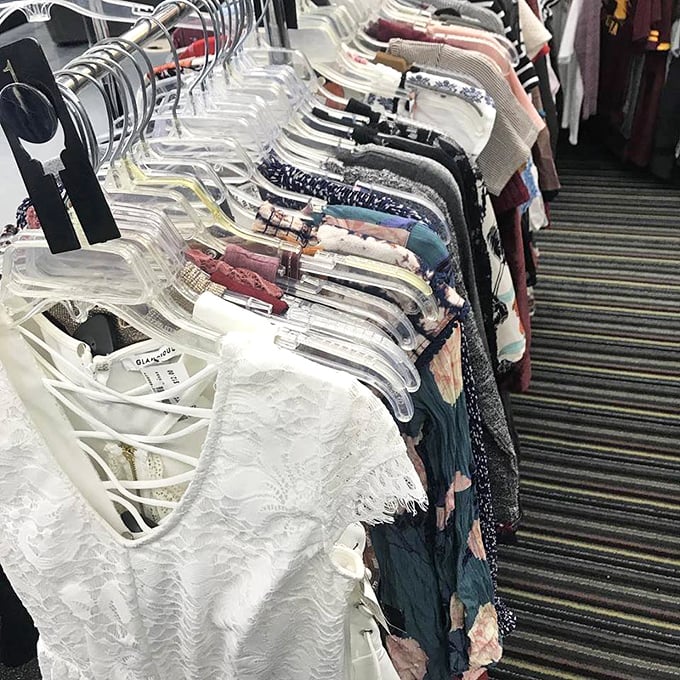 Blouses and tops arranged in a rainbow gradient that would make Marie Kondo weep with joy &ndash; and your credit card sigh with relief.