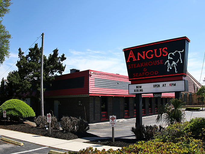 Angus Steakhouse's bold red and black exterior makes a statement as strong as the flavors waiting inside.