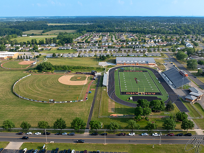 Athletic fields and green spaces stretch like a retirement dream where recreation costs nothing extra.