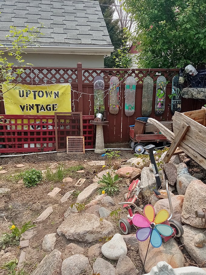 Uptown Vintage announces itself with skateboards on a fence - the first clue that this isn't your grandmother's antique shop.