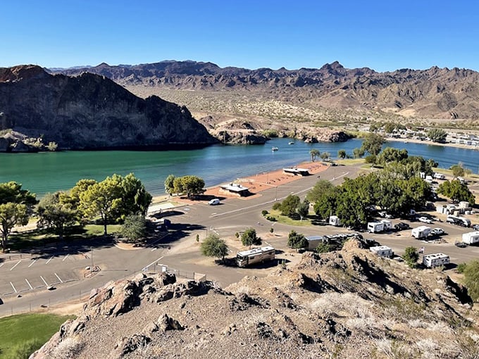 The Colorado River carves its ancient story through Buckskin Mountain's dramatic landscape.