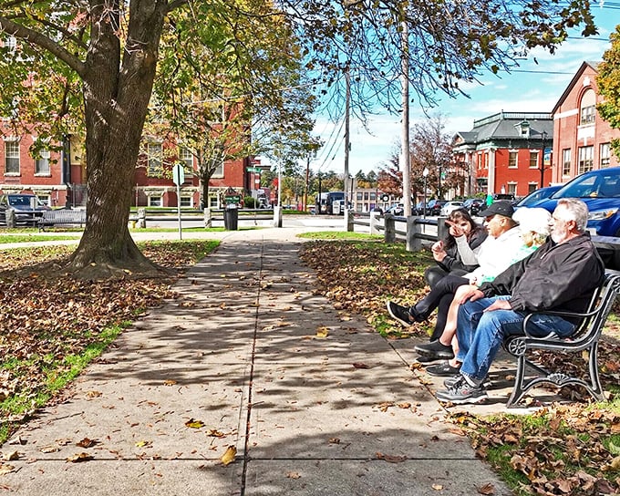 Clinton's town center showcases its classic New England charm, complete with park benches perfect for watching the world go by.
