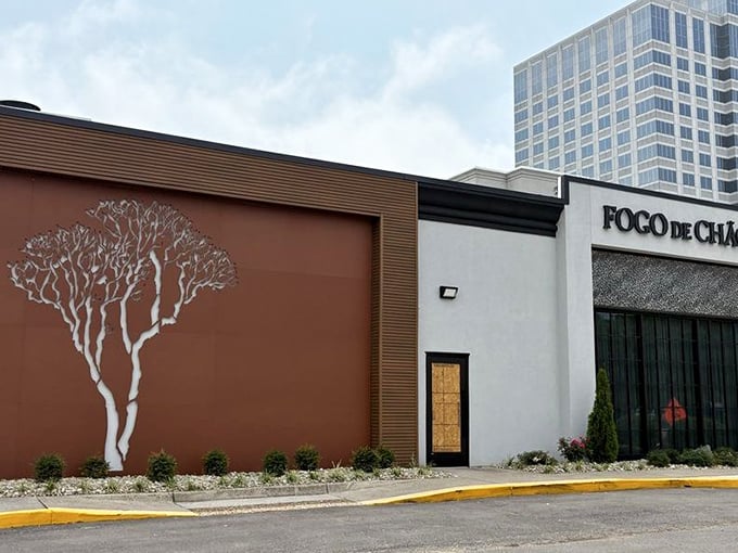 Fogo de Chão's modern exterior stands out with its artistic tree silhouette. Inside, meat servers dance with skewers of Brazilian-style perfection.