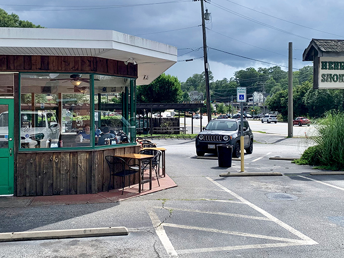 Henry's corner location makes it the neighborhood barbecue gathering spot. Where the smell of hickory smoke becomes a welcome sign.