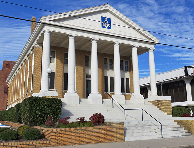 Classic Masonic hall architecture represents the fraternal bonds that strengthen small Southern communities. 