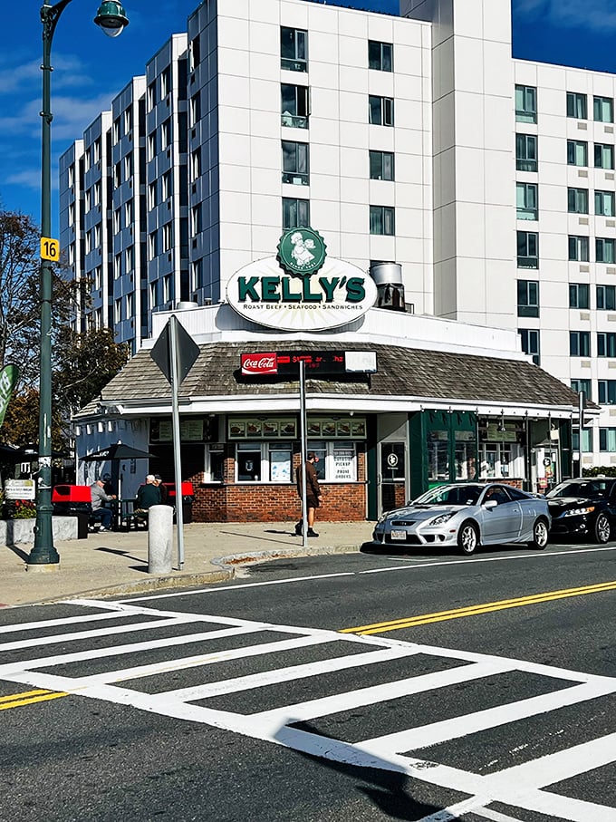 Kelly's Roast Beef's distinctive sign stands sentinel over Revere Beach Boulevard. This humble building houses late-night seafood magic that locals treasure.