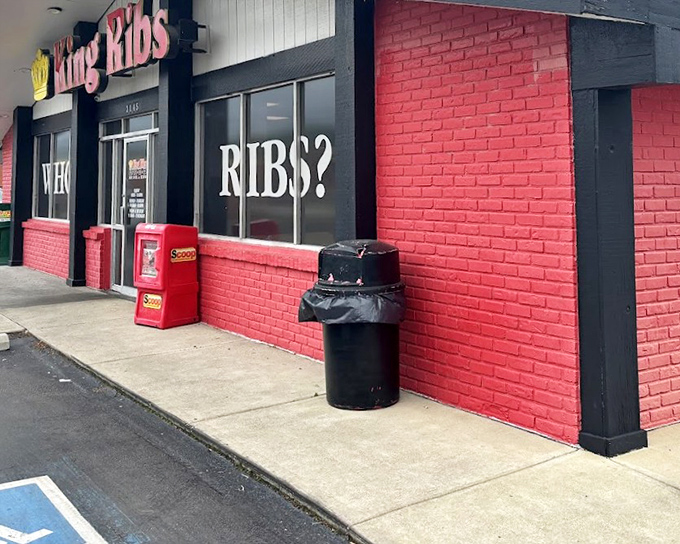 King Ribs' bold red exterior with that royal crown logo makes a promise it definitely keeps. BBQ royalty resides here!